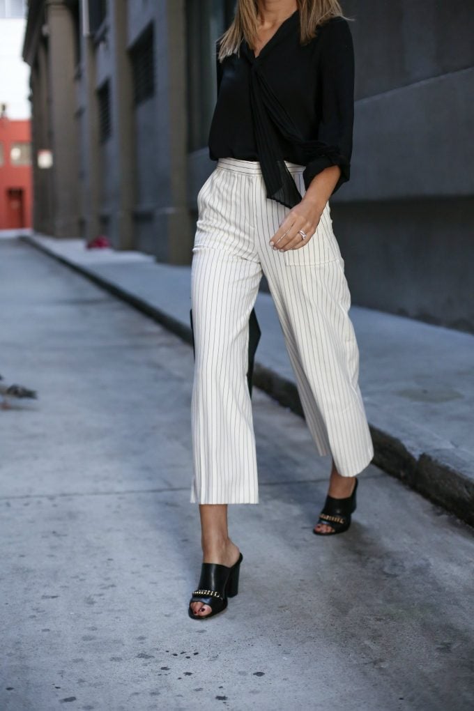 pinstripe-wide-leg-cropped-pants-black-tie-neck-blouse-block-heel-mules ...